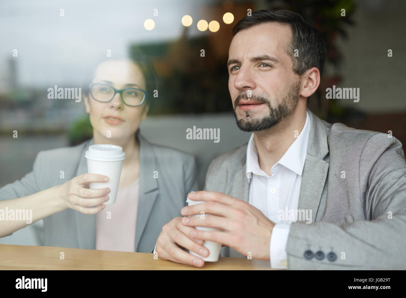 Colleagues with drinks Stock Photo - Alamy