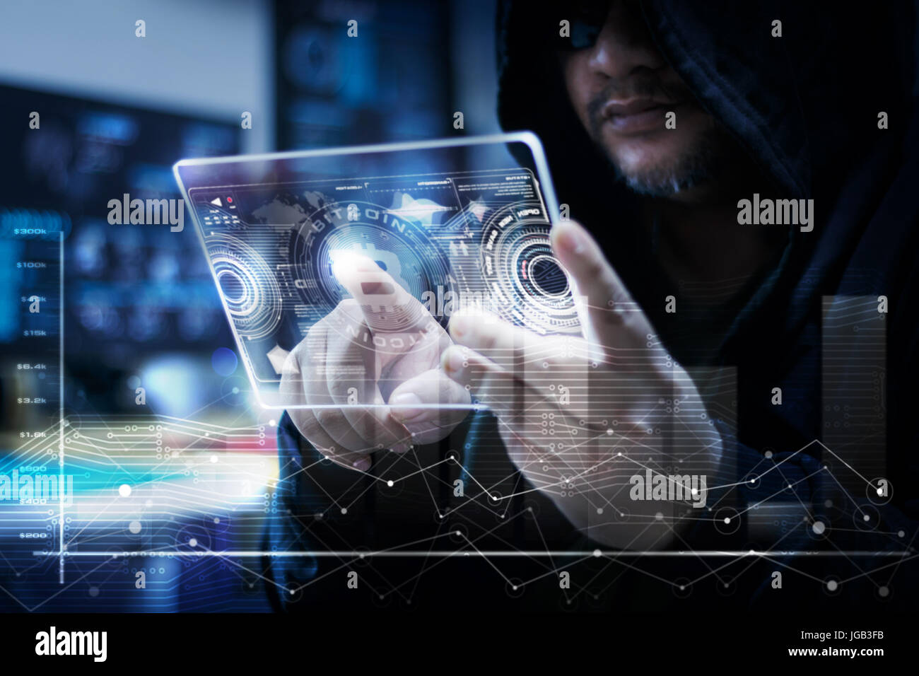 Hacker using clear tablet with HUD panel and bitcoin code graph bar ...