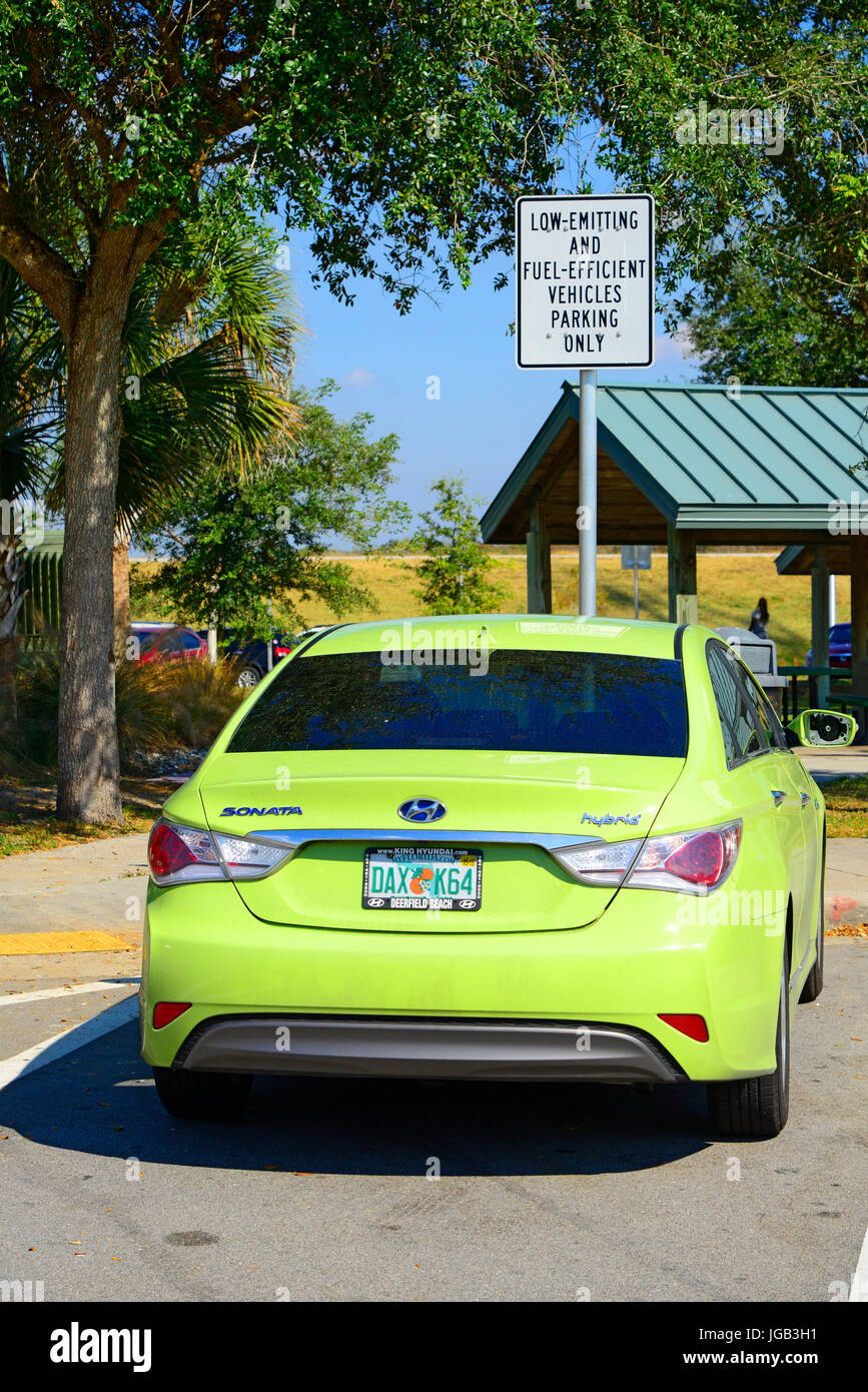 Low emitting and fuel efficient vehicles parking area Stock Photo - Alamy