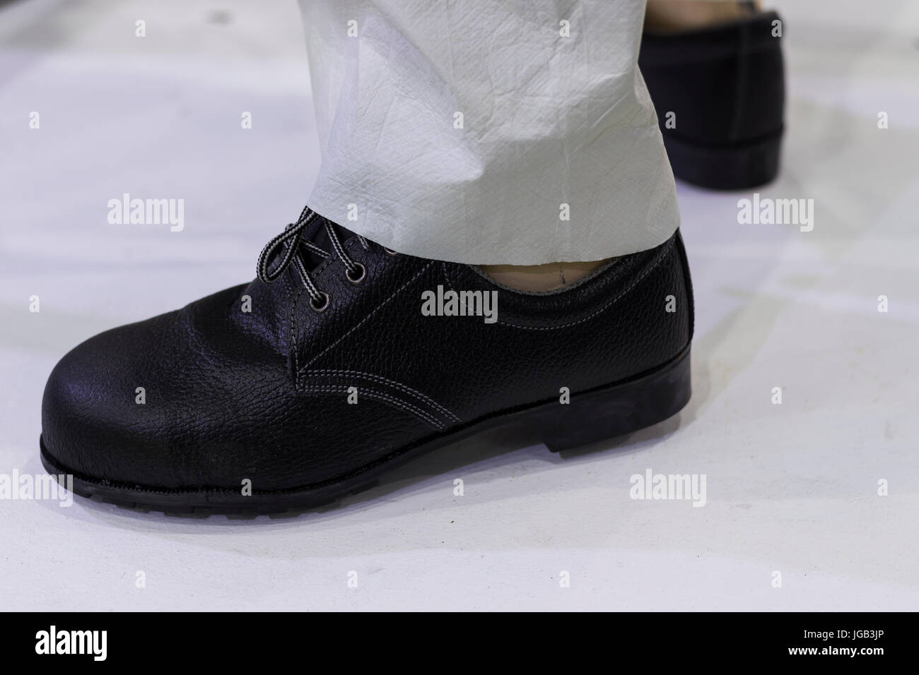 Safety shoe hi-res stock photography and images - Alamy