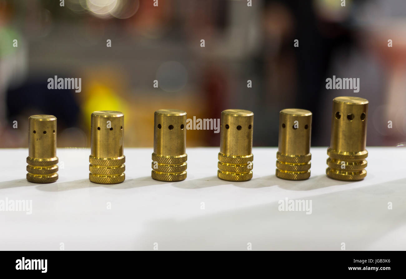 fire fighting hose nozzles on a white plate Stock Photo - Alamy