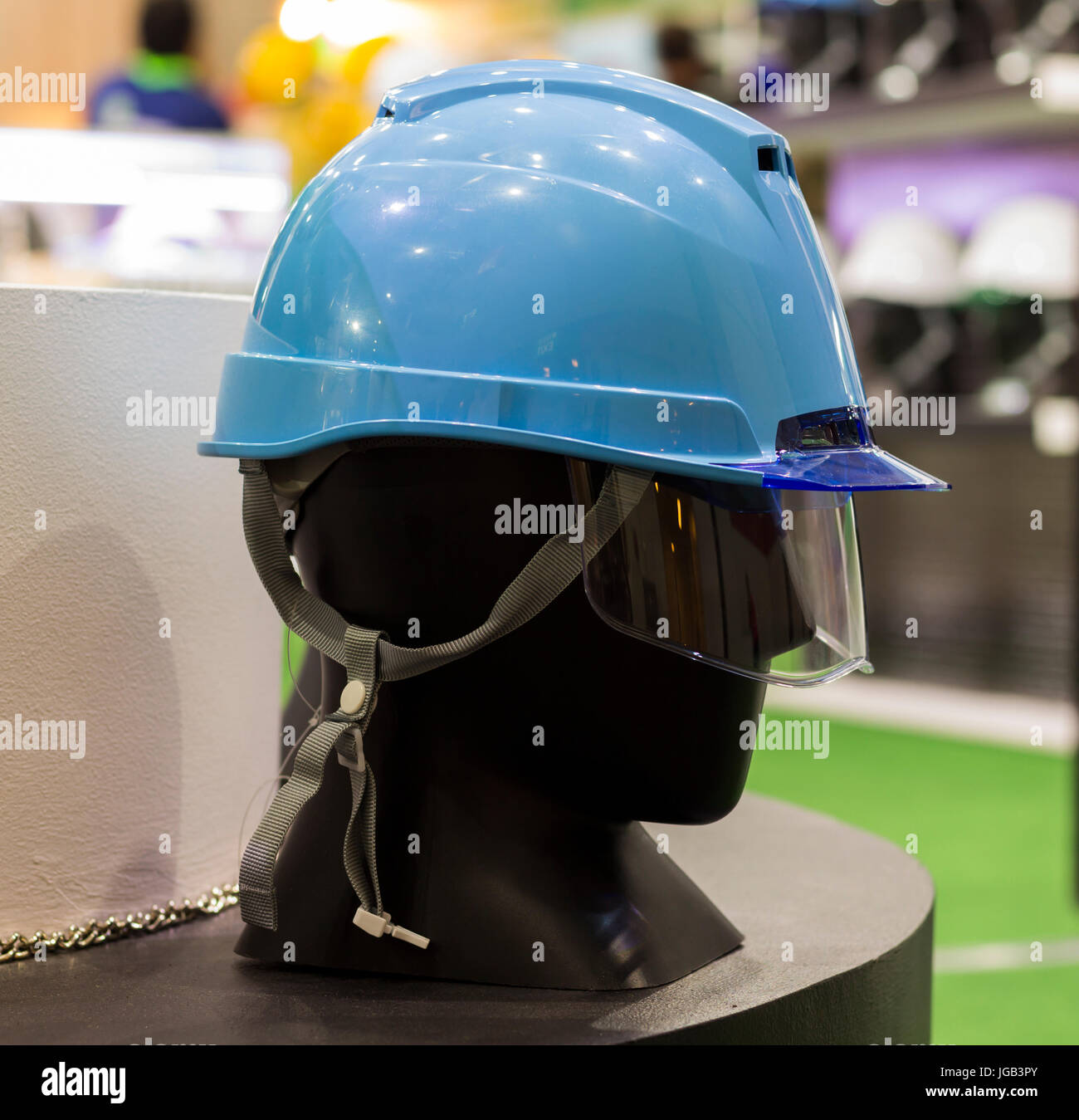mannequins with Blue Safety helmet and safety glasses on a shelf ...