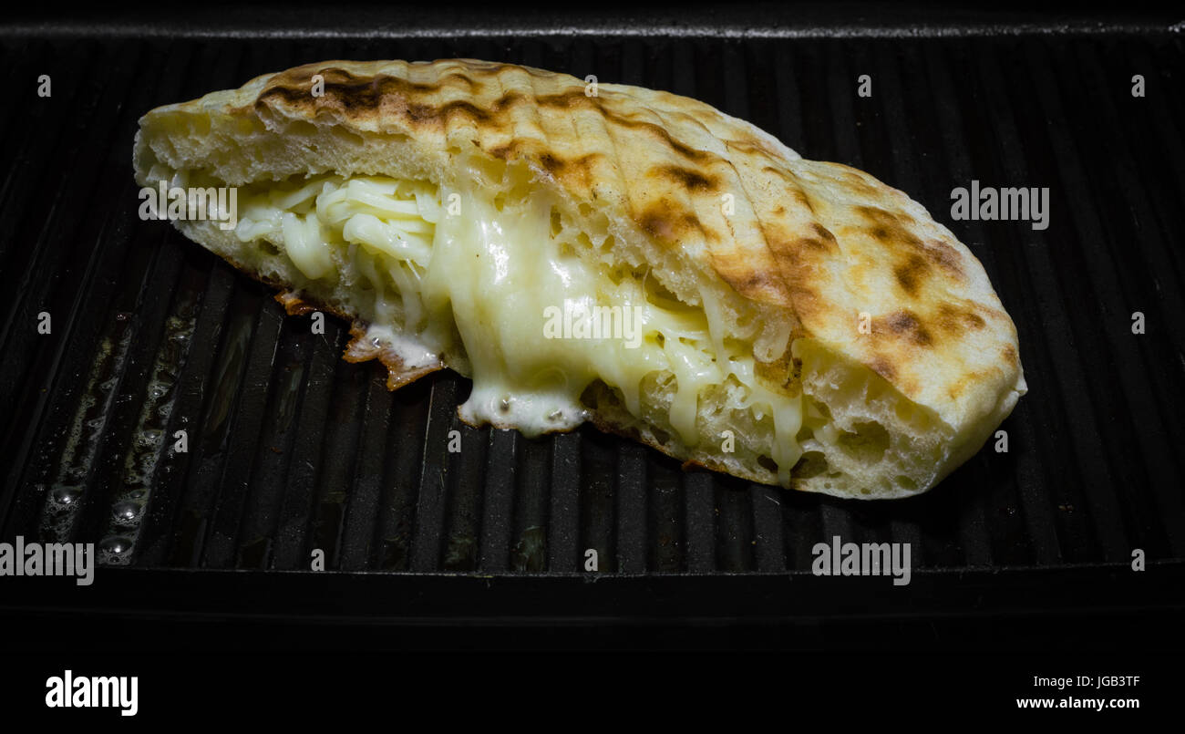 Closeup of Turkish toast (Tost), toasted sandwich with cheddar cheese ...