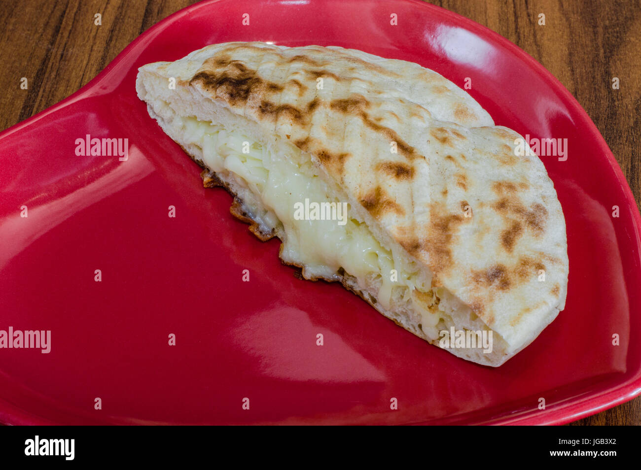 Closeup of Turkish toast (Tost), toasted sandwich with cheddar cheese ...