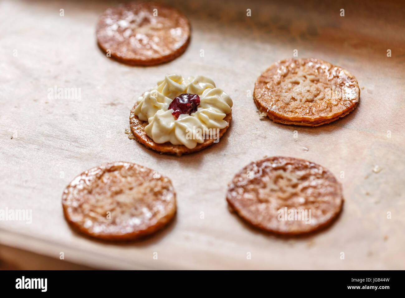 Mille-feuille cake with vanilla cream and jam Stock Photo - Alamy