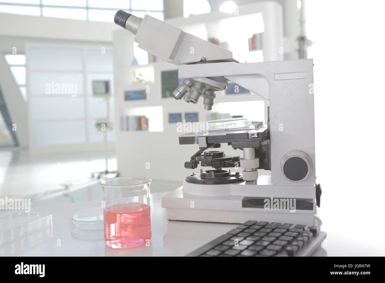 a bicular microscope in scientist laboratory Stock Photo - Alamy