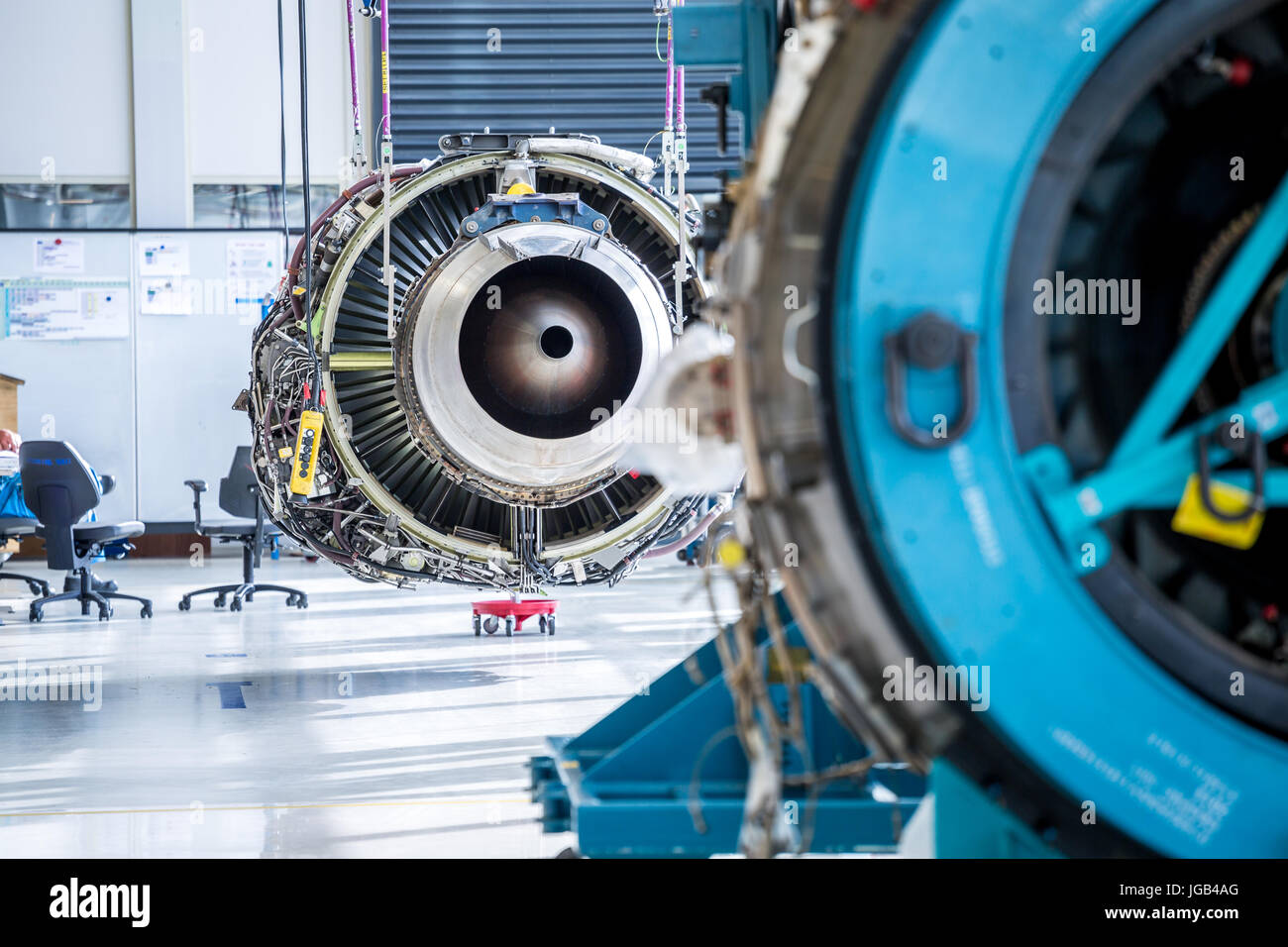 Engine's maintenance in huge industrial hall Stock Photo - Alamy