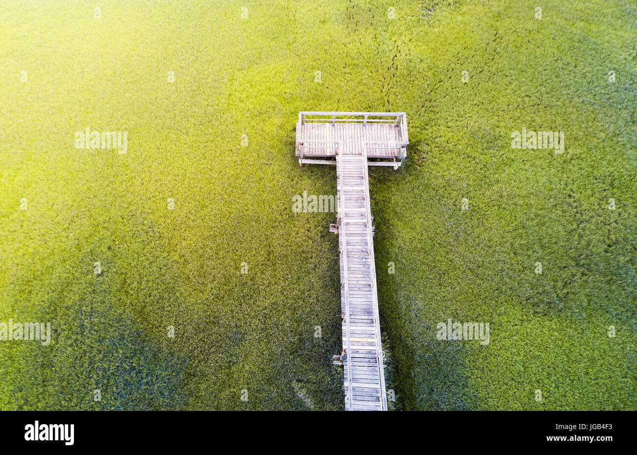 Wooden bridge over a swamp aerial view Stock Photo - Alamy