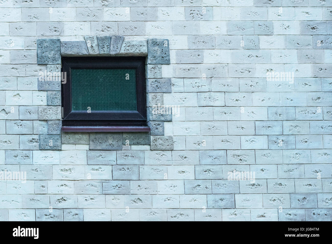 Photo texture of an old window on a decorative wall made of brick ...