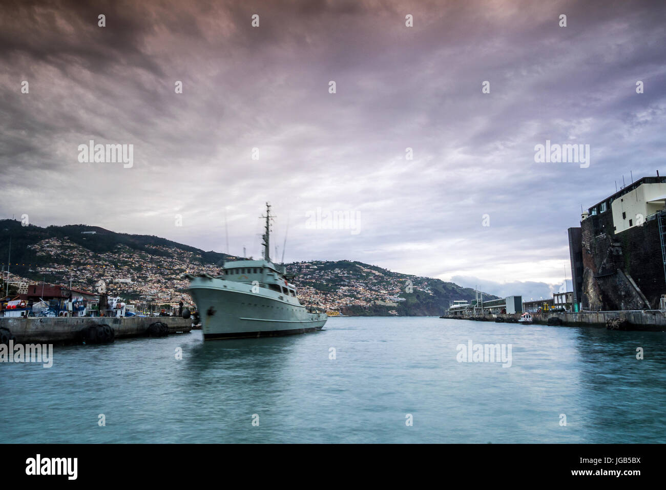 Ship coming into the Funchal port at sunrise, Madeira Stock Photo - Alamy