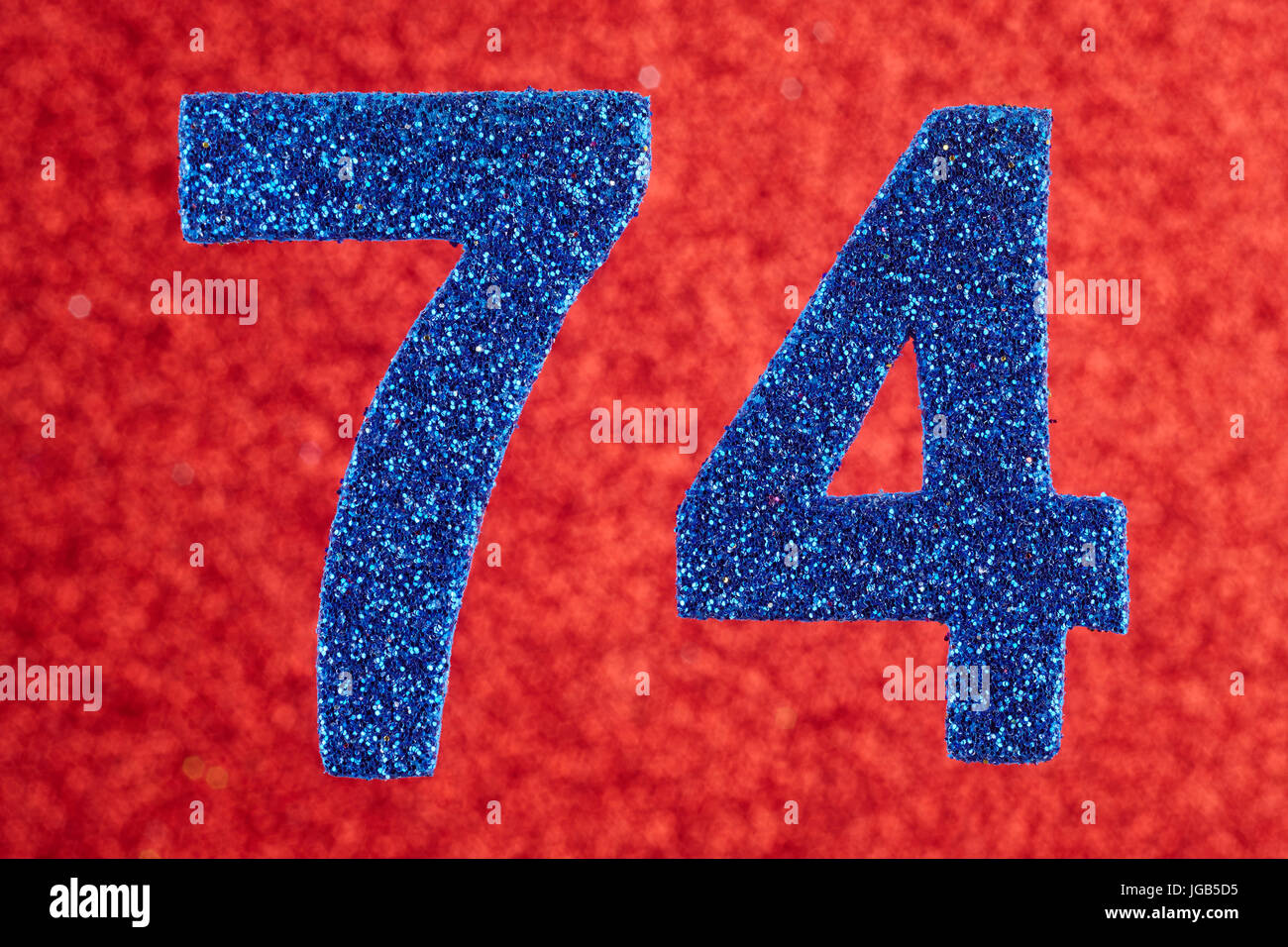 Number seventy-four blue color over a red background. Anniversary. Horizontal Stock Photo - Alamy