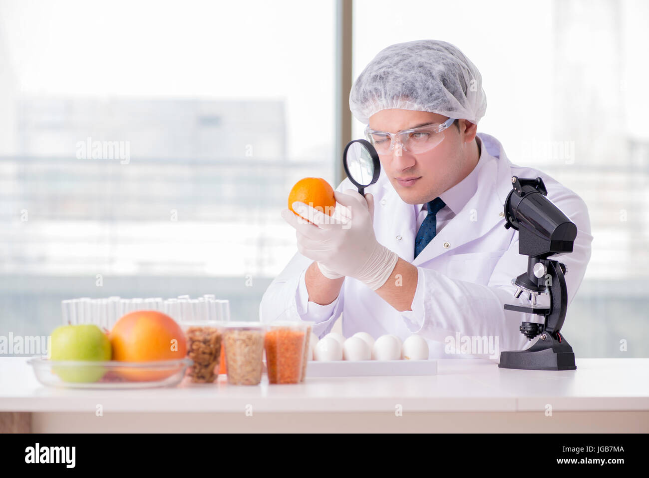 Nutrition expert testing food products in lab Stock Photo - Alamy