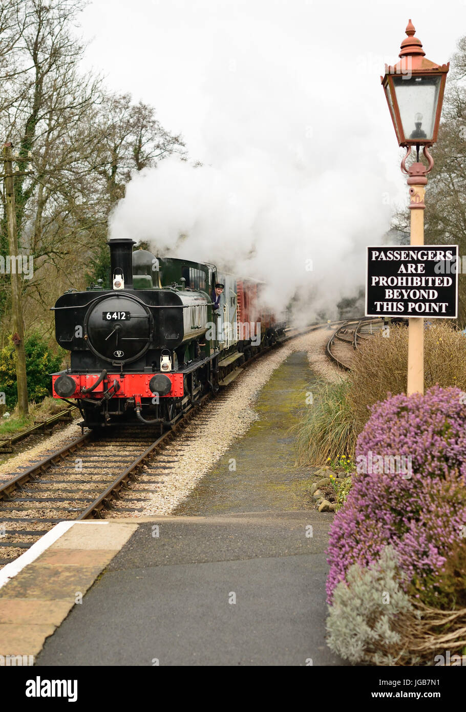 GWR 0-6-0 pannier tank No 6412 hauling a goods train through Staverton ...