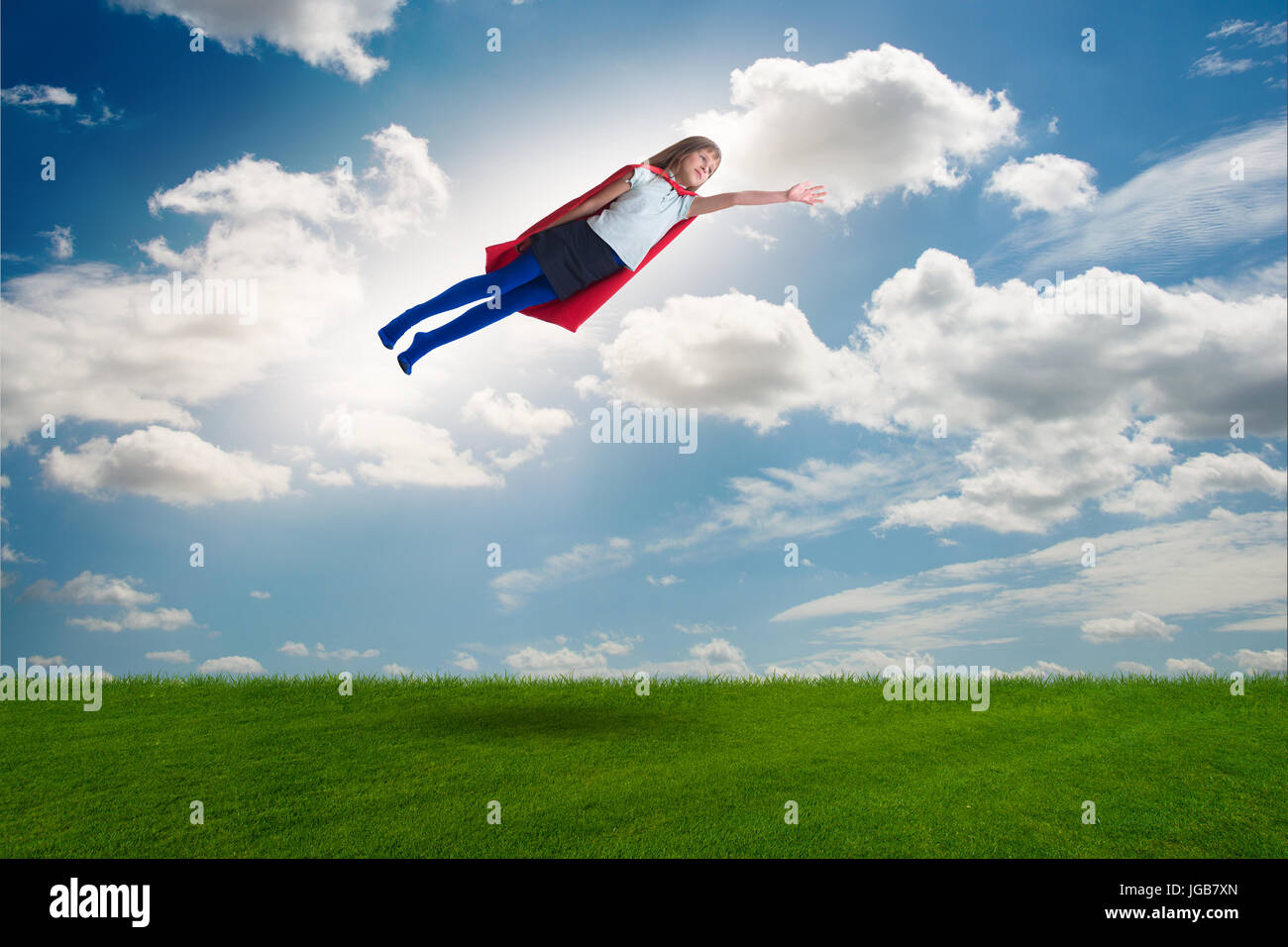 Superhero kid flying in dream concept Stock Photo - Alamy