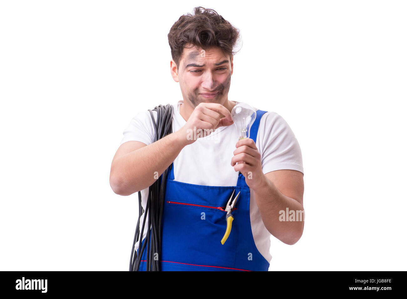 Funny man doing electrical repair Stock Photo - Alamy