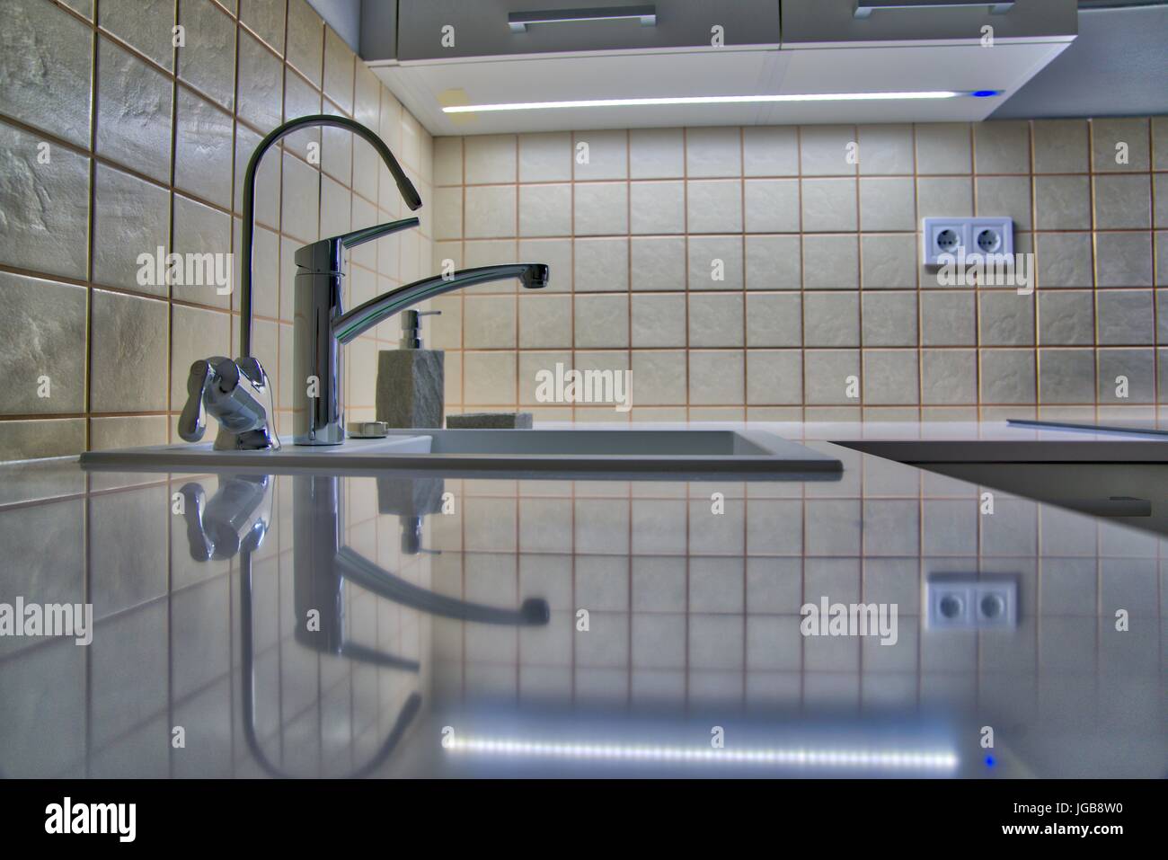Kitchen counter, sink and tap Stock Photo - Alamy