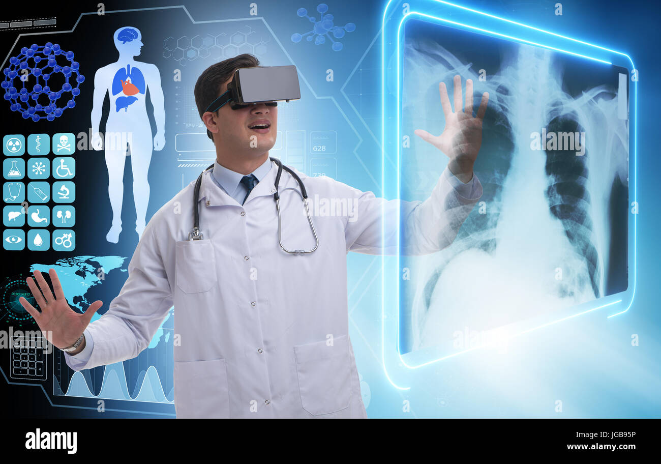 Doctor examining x-ray images using virtual reality glasses Stock Photo ...