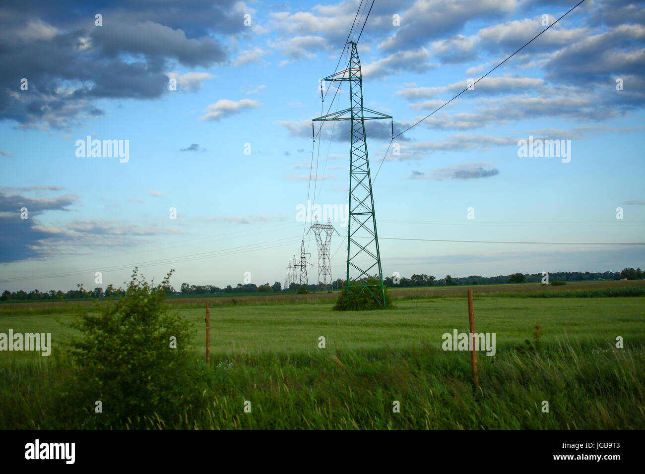 Electricity power lines in rural landscape Stock Photo - Alamy