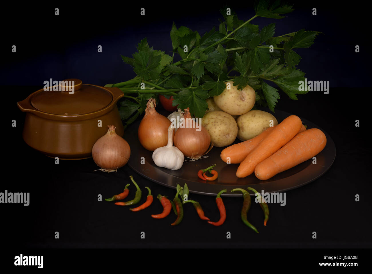 Soup Ingredients on black background Stock Photo - Alamy
