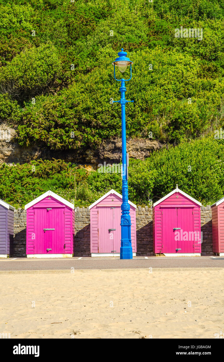 Colored houses on the beach, colorful door to summer cottages, seaside ...