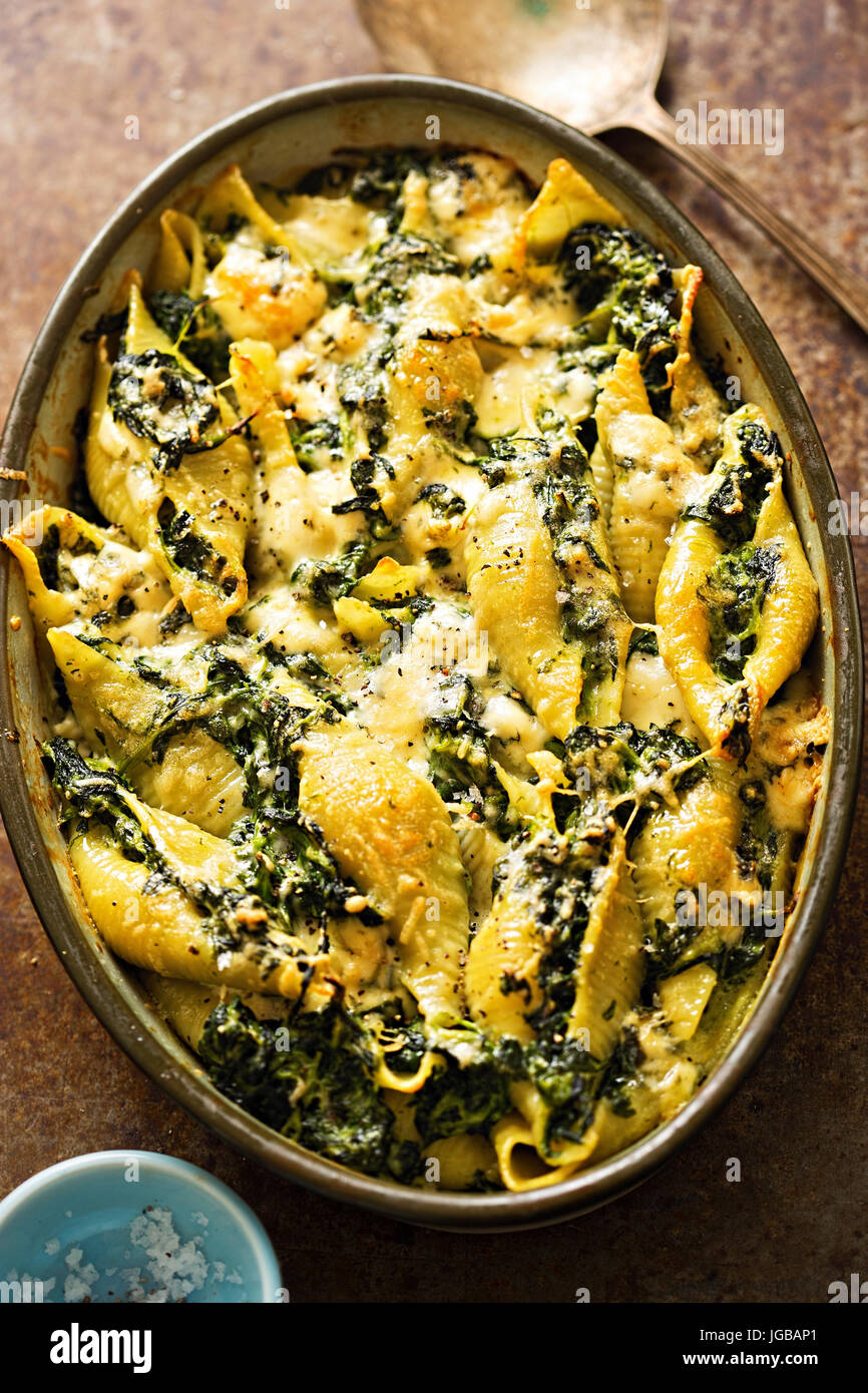 Spinach jumbo seashell pasta with parmesan and blue cheese bake Stock ...