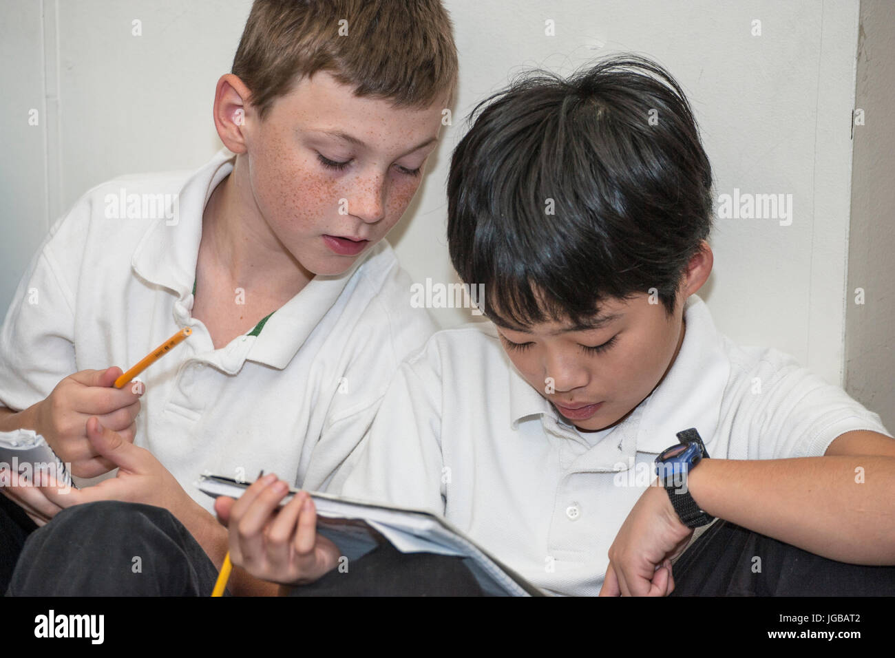 Helping each other class hi-res stock photography and images - Alamy