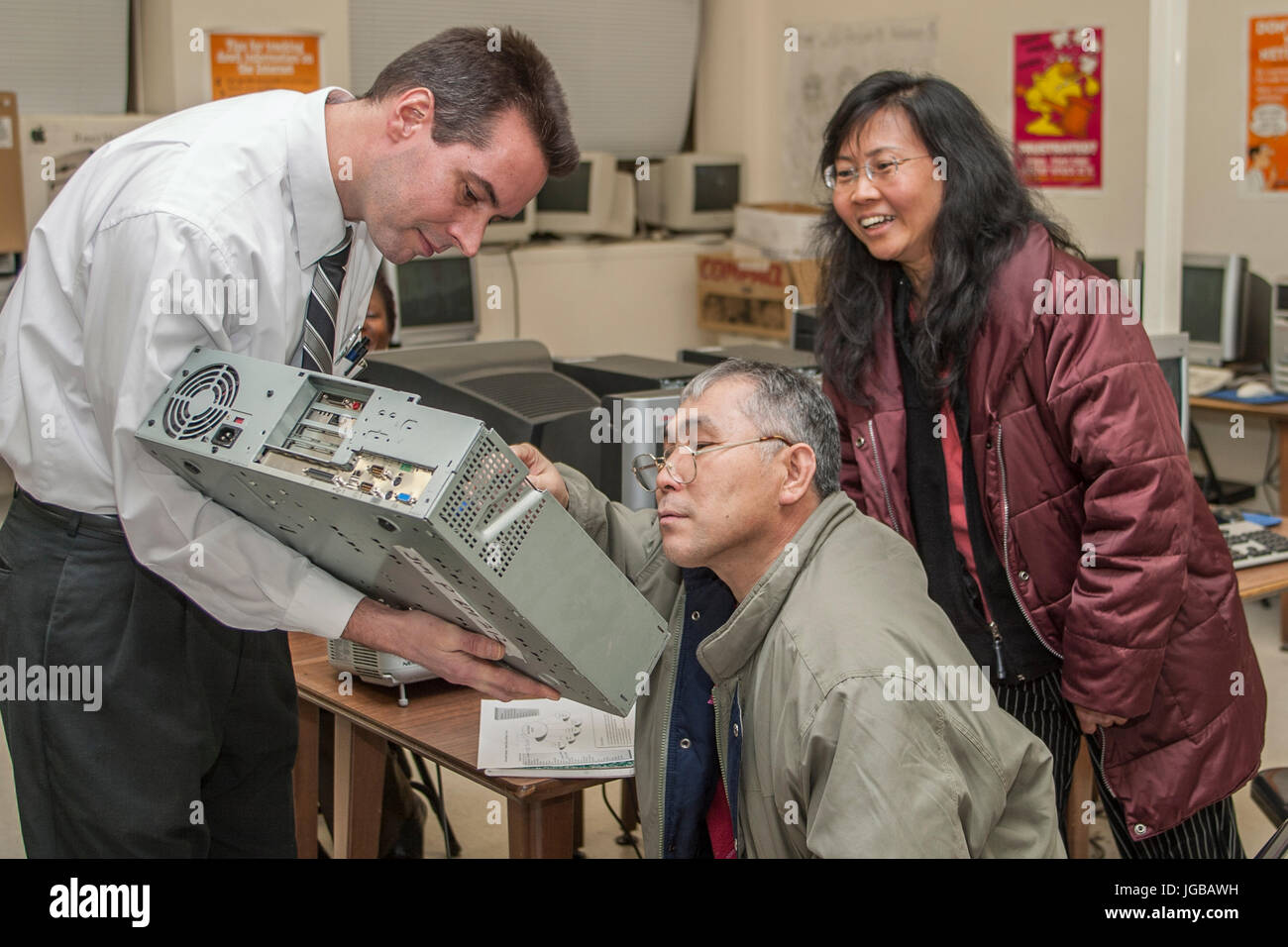 Seniors learning computer skills hi-res stock photography and images ...