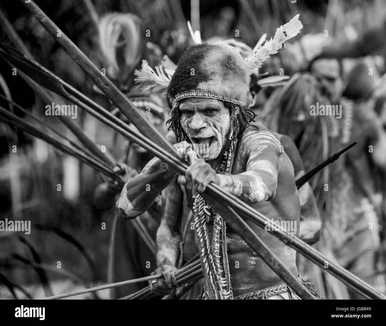 Papua new guinea tribe bow and arrow Black and White Stock Photos ...
