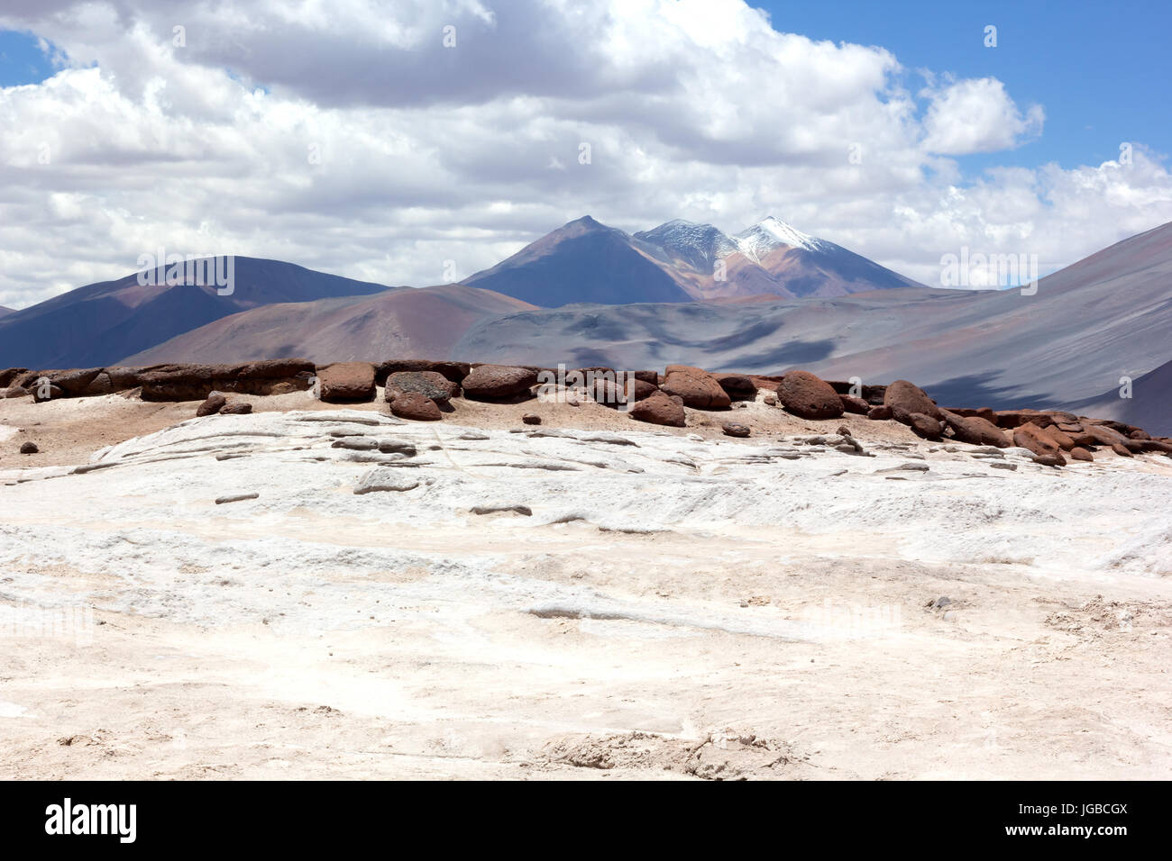 Salt flats, red rocks and volcanic mountains of San Pedro de Atacama ...