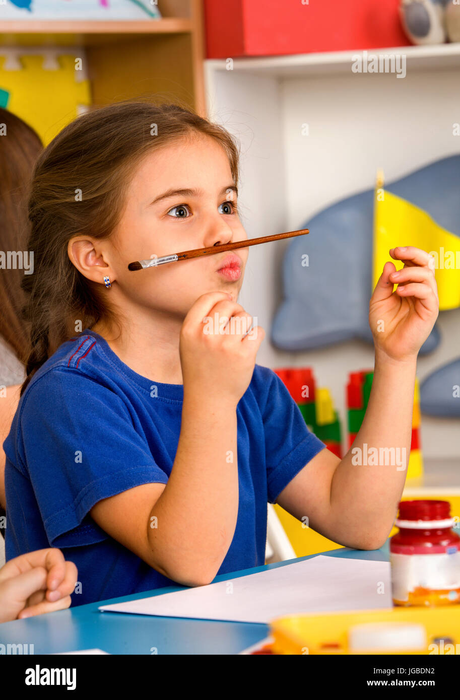 Small students children painting in art school class Stock Photo - Alamy