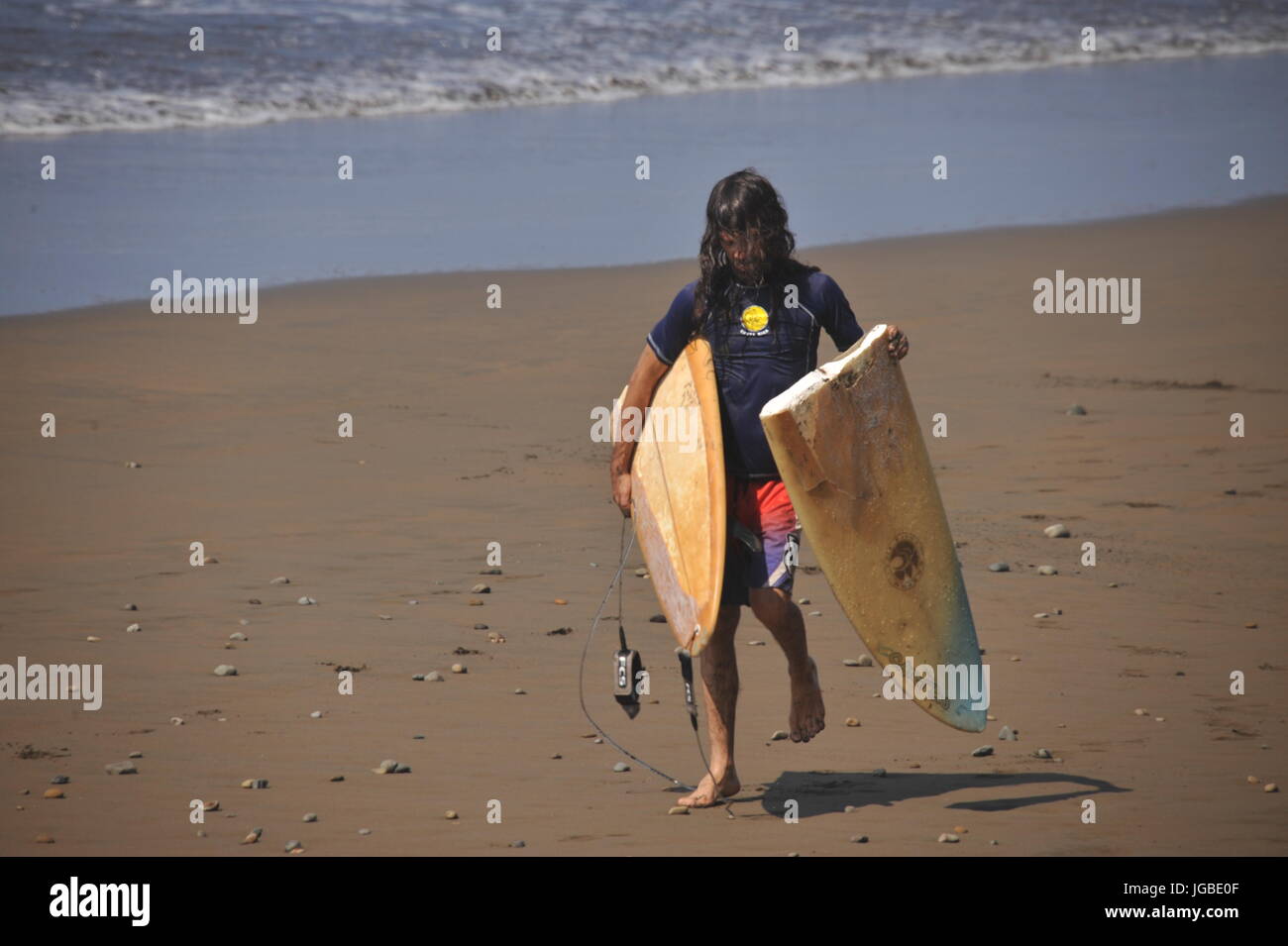 Carrying under arms hi-res stock photography and images - Alamy