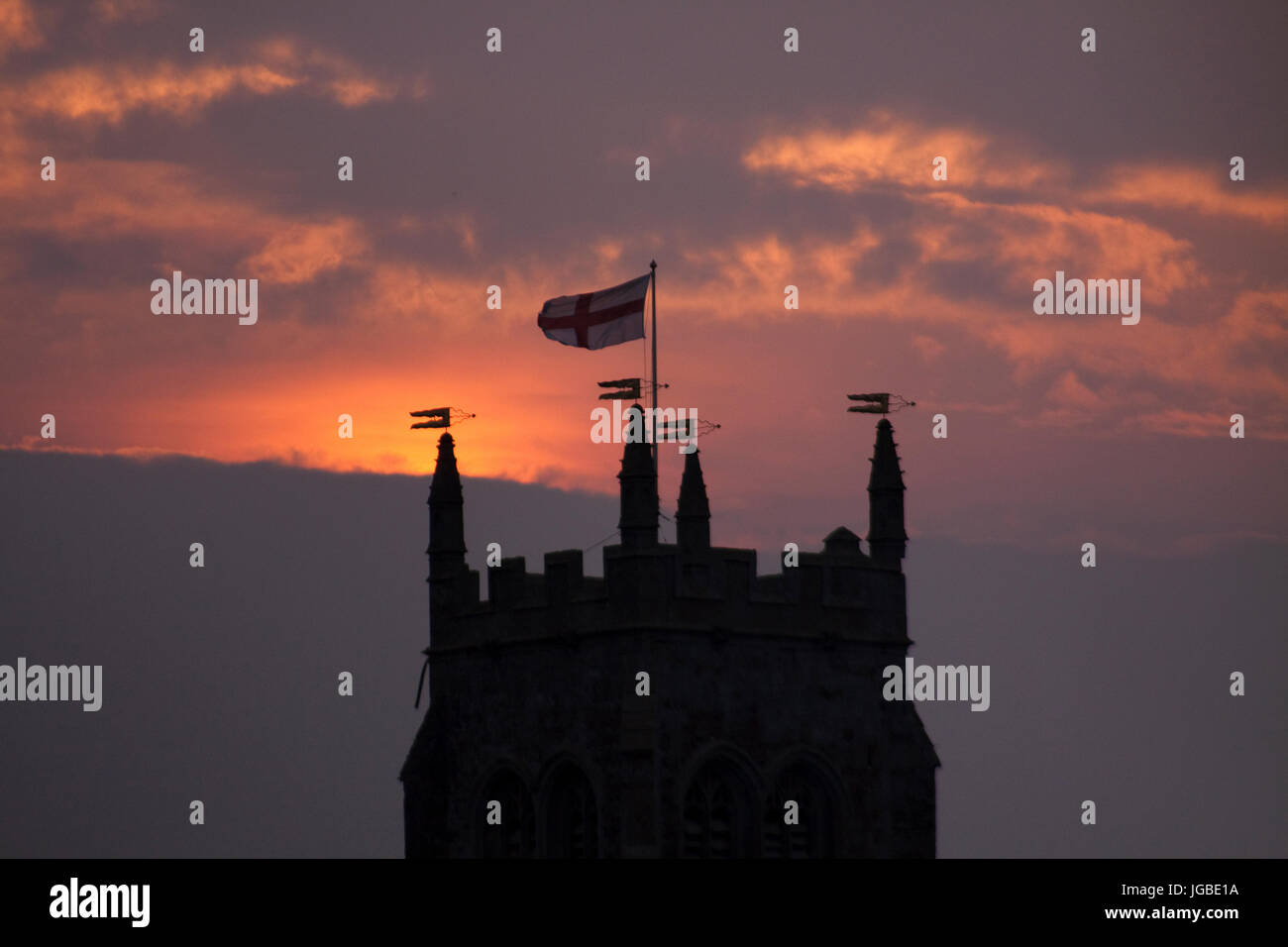 Sunset clouds behind cross hi-res stock photography and images - Alamy
