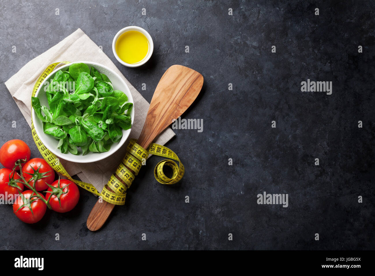 Healthy salad bowl on stone table. Top view with copy space Stock Photo ...