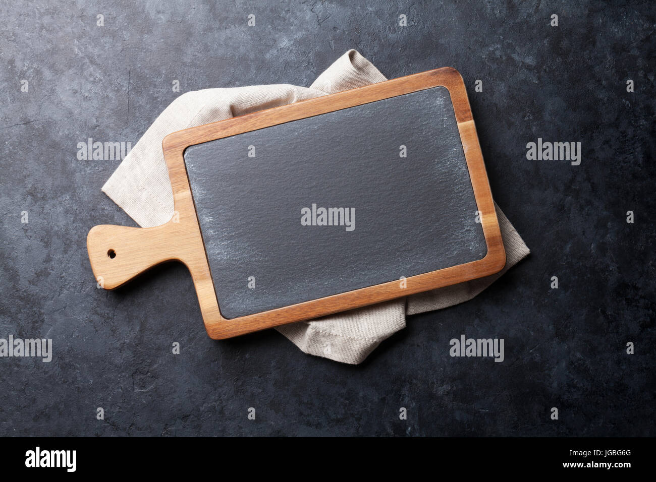 Cooking utensils on stone table. Top view with chalkboard for your ...