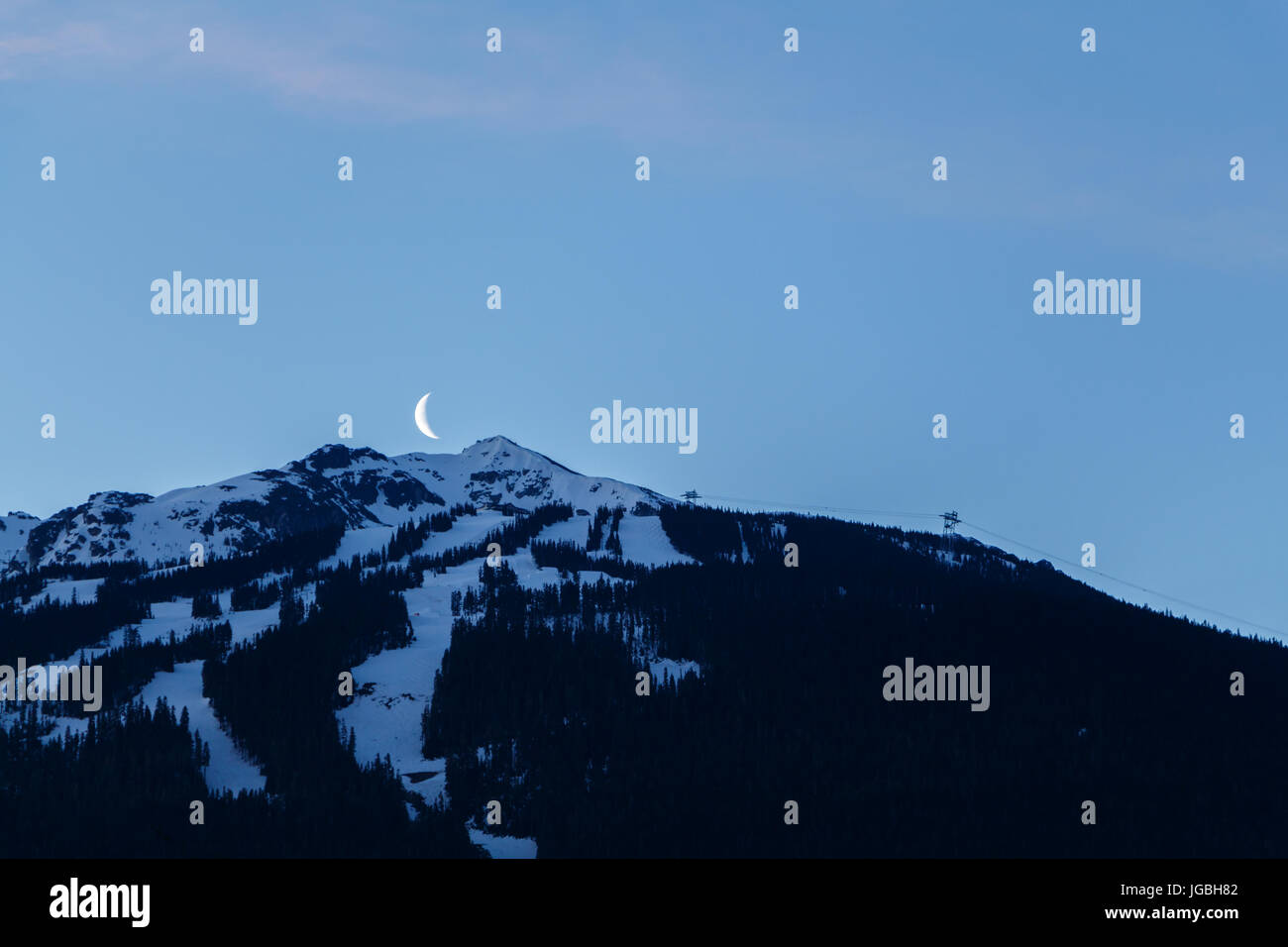 The moon rising over Blackcomb Peak at dawn. Taken in Whistler, Canada ...