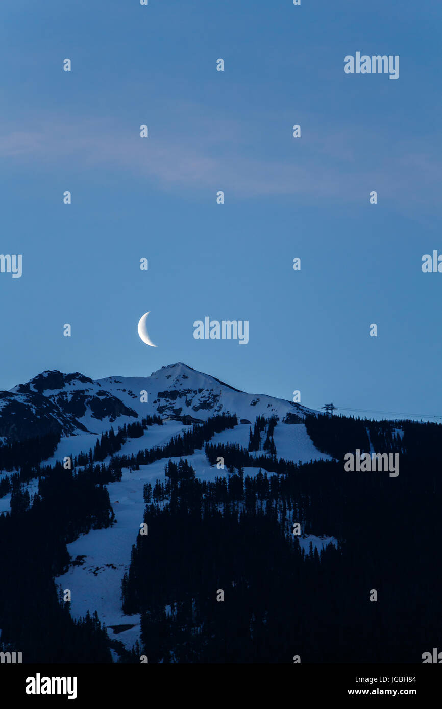 The moon rising over Blackcomb Peak at dawn. Taken in Whistler, Canada ...