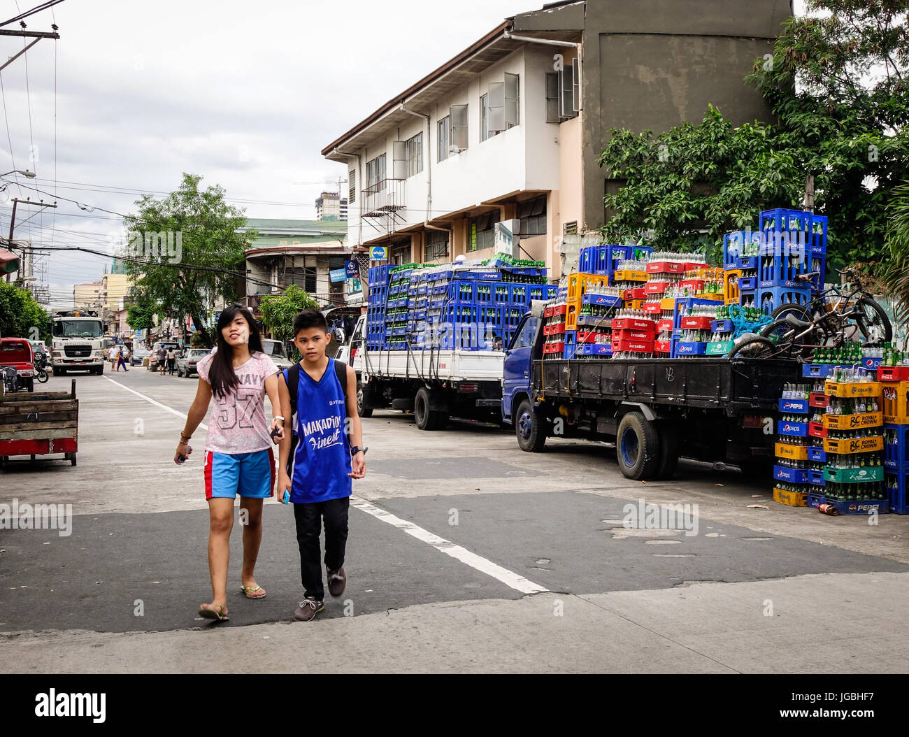 Manila, Philippines - Dec 20, 2015. Children walking on street in ...