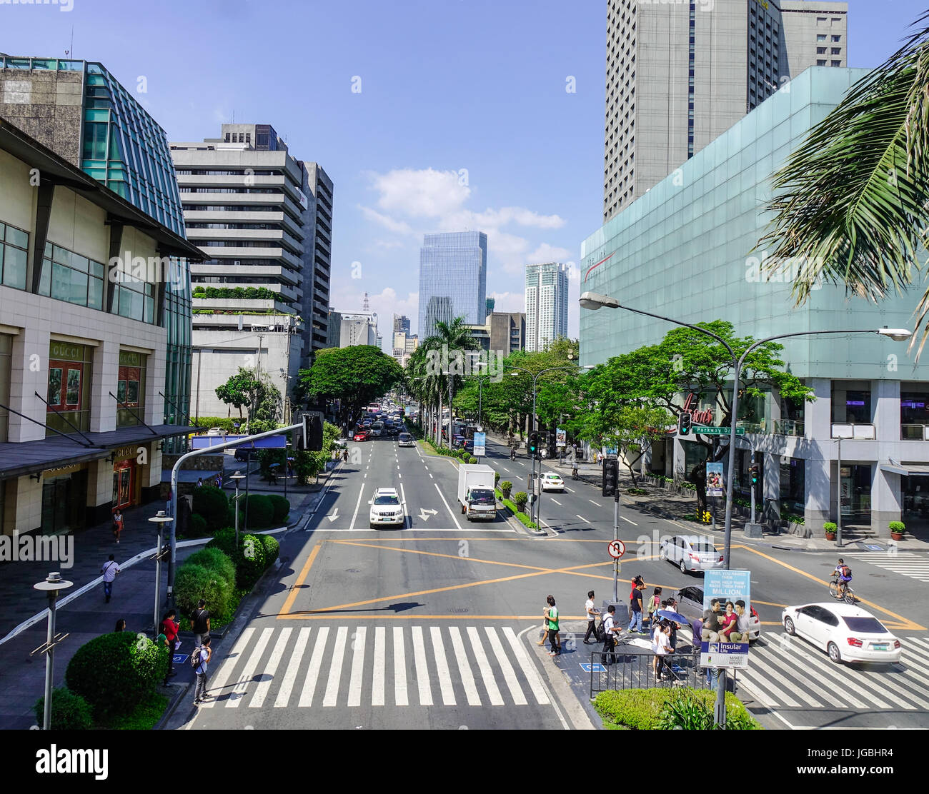 Manila, Philippines - Apr 12, 2017. Vehicles run on street in Makati ...