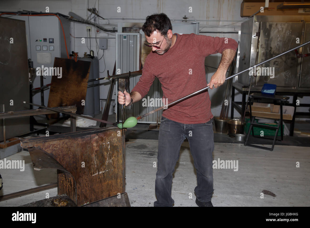 Glass blowing rods hi-res stock photography and images - Alamy