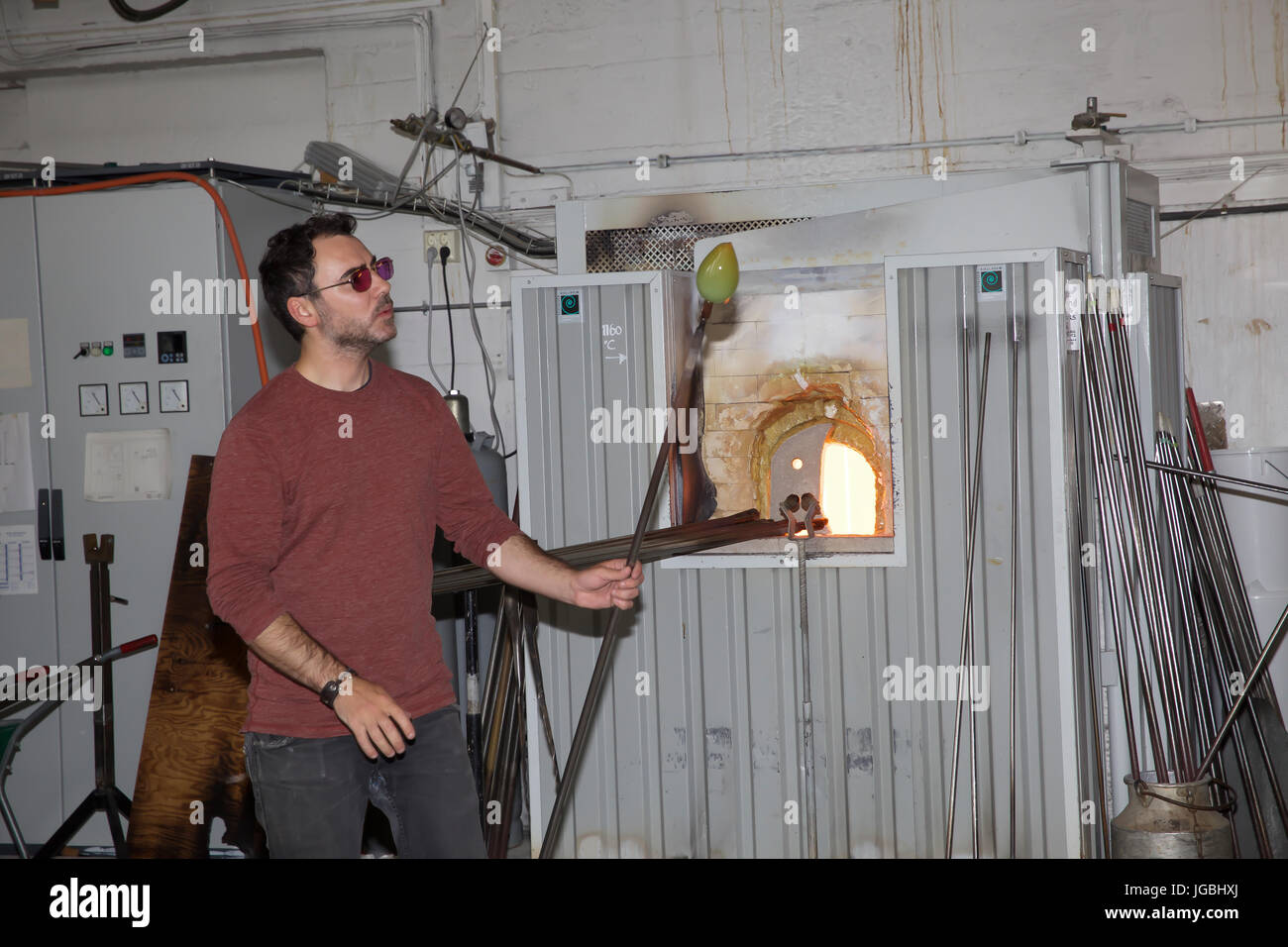 Glass blowing rods hi-res stock photography and images - Alamy