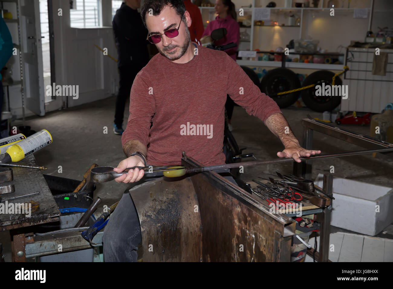 Glass blowing rods hi-res stock photography and images - Alamy