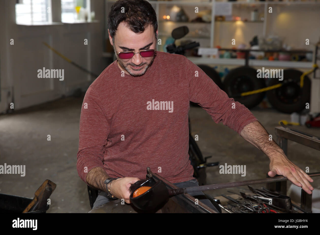 Glass blowing shop in Alesund Norway Stock Photo - Alamy