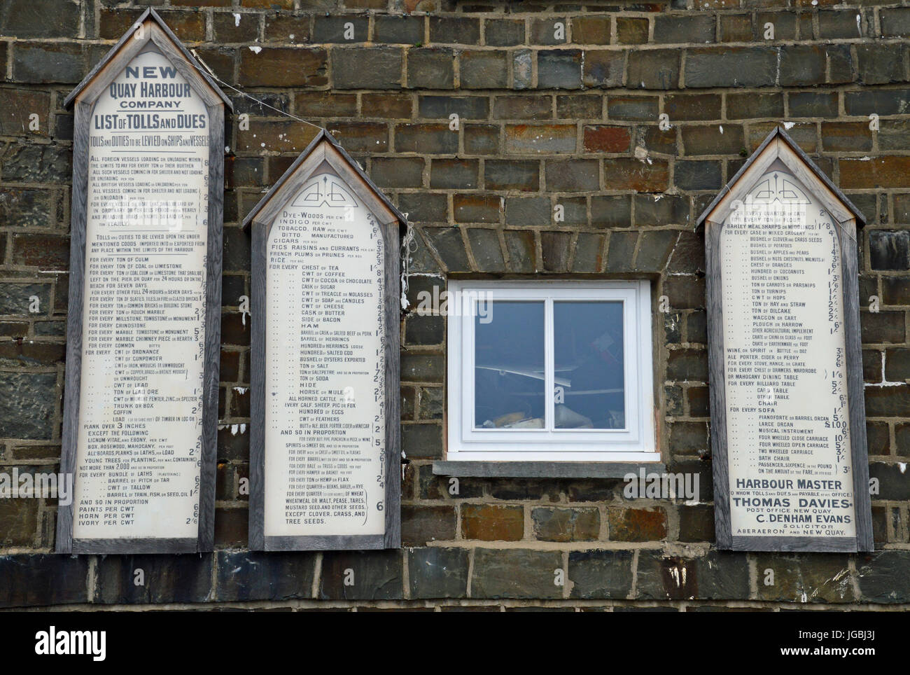 Old harbour dues notices, New Quay, Ceredigion, Wales Stock Photo - Alamy