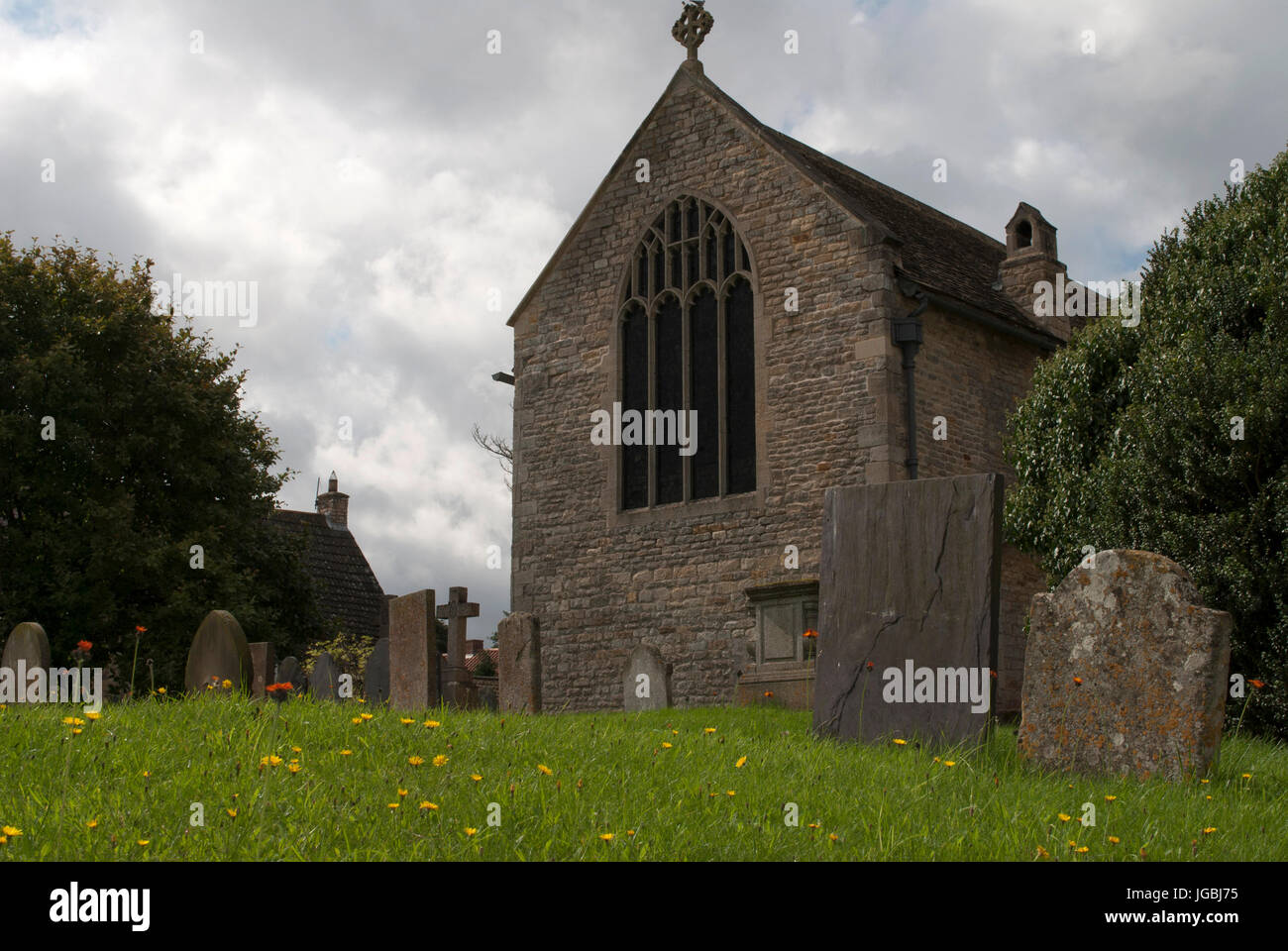 village church with graveyard Stock Photo - Alamy