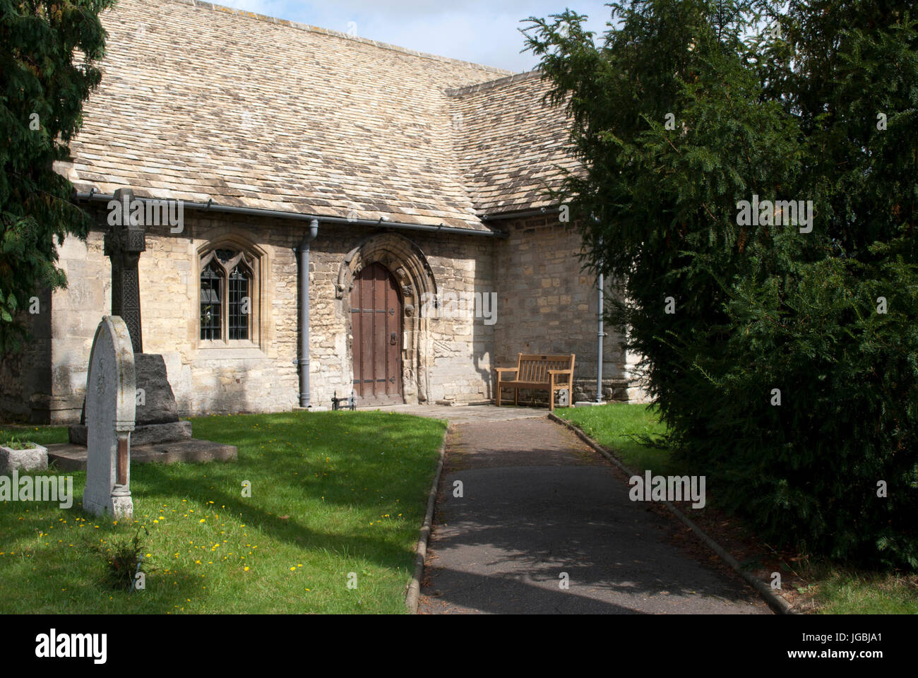 Side entrance to Village church Stock Photo - Alamy