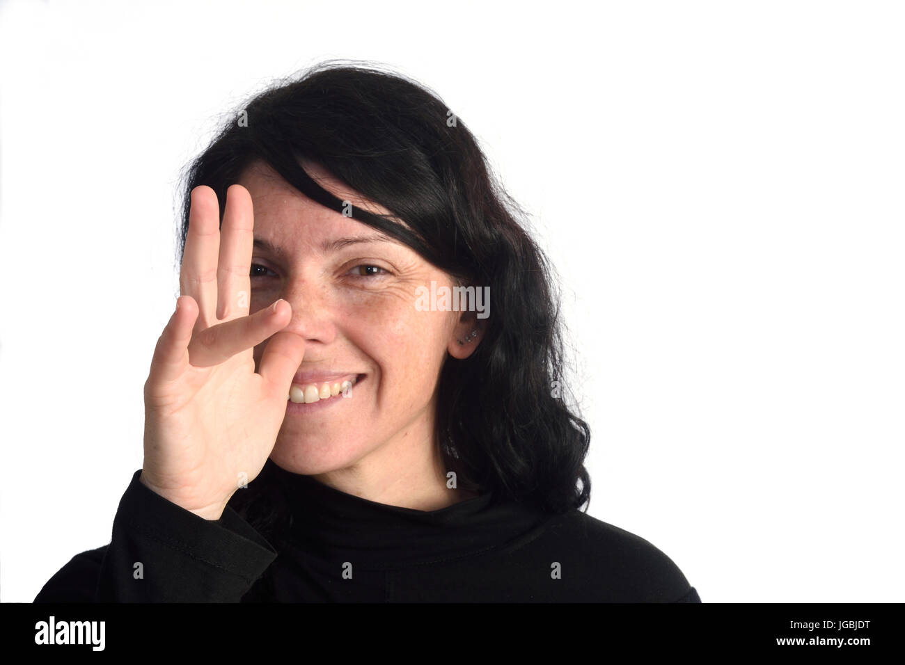 One woman cover mouth lips hi-res stock photography and images - Alamy