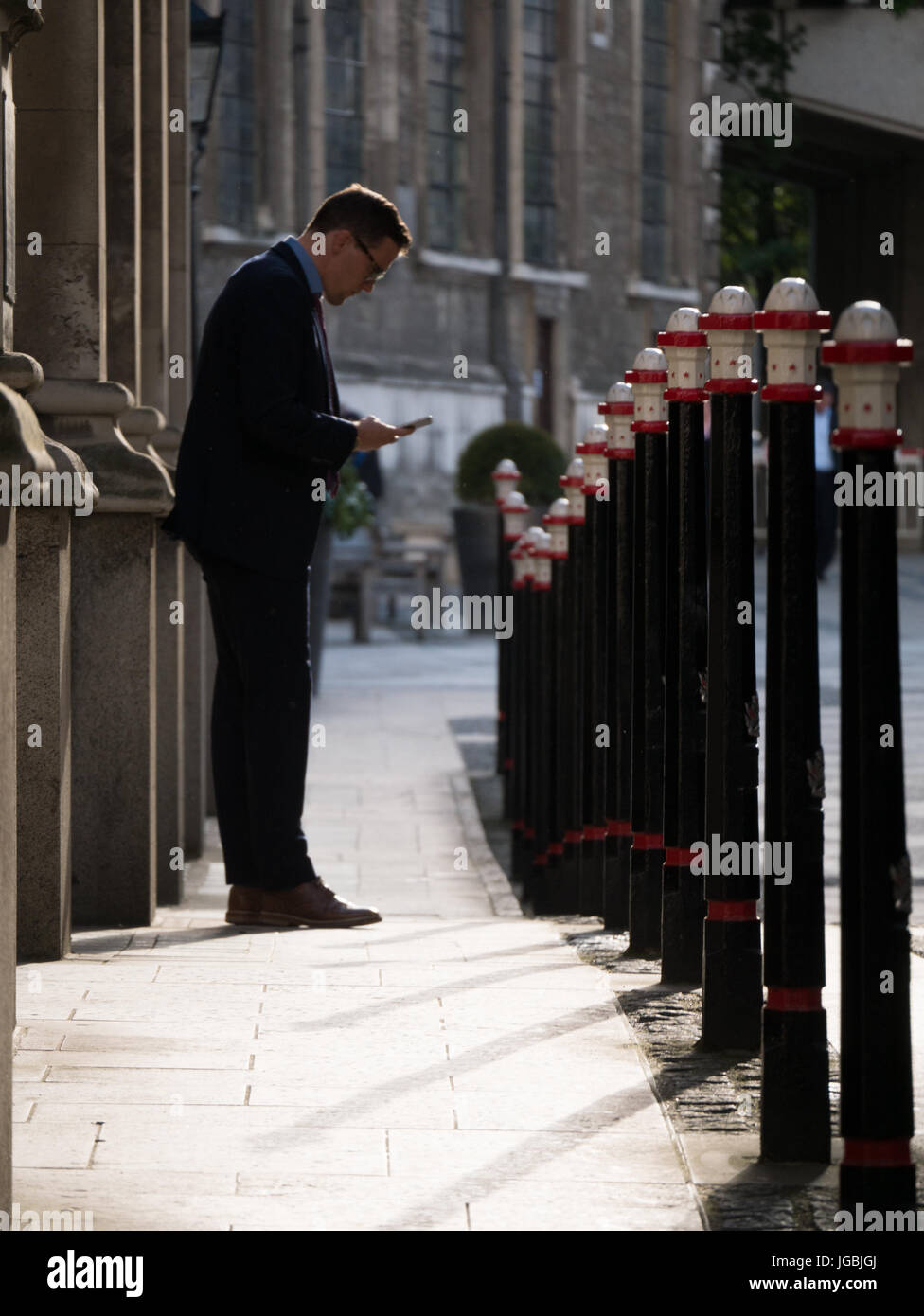 Man checking phone Stock Photo - Alamy Man checking phone Stock Photo - Alamy