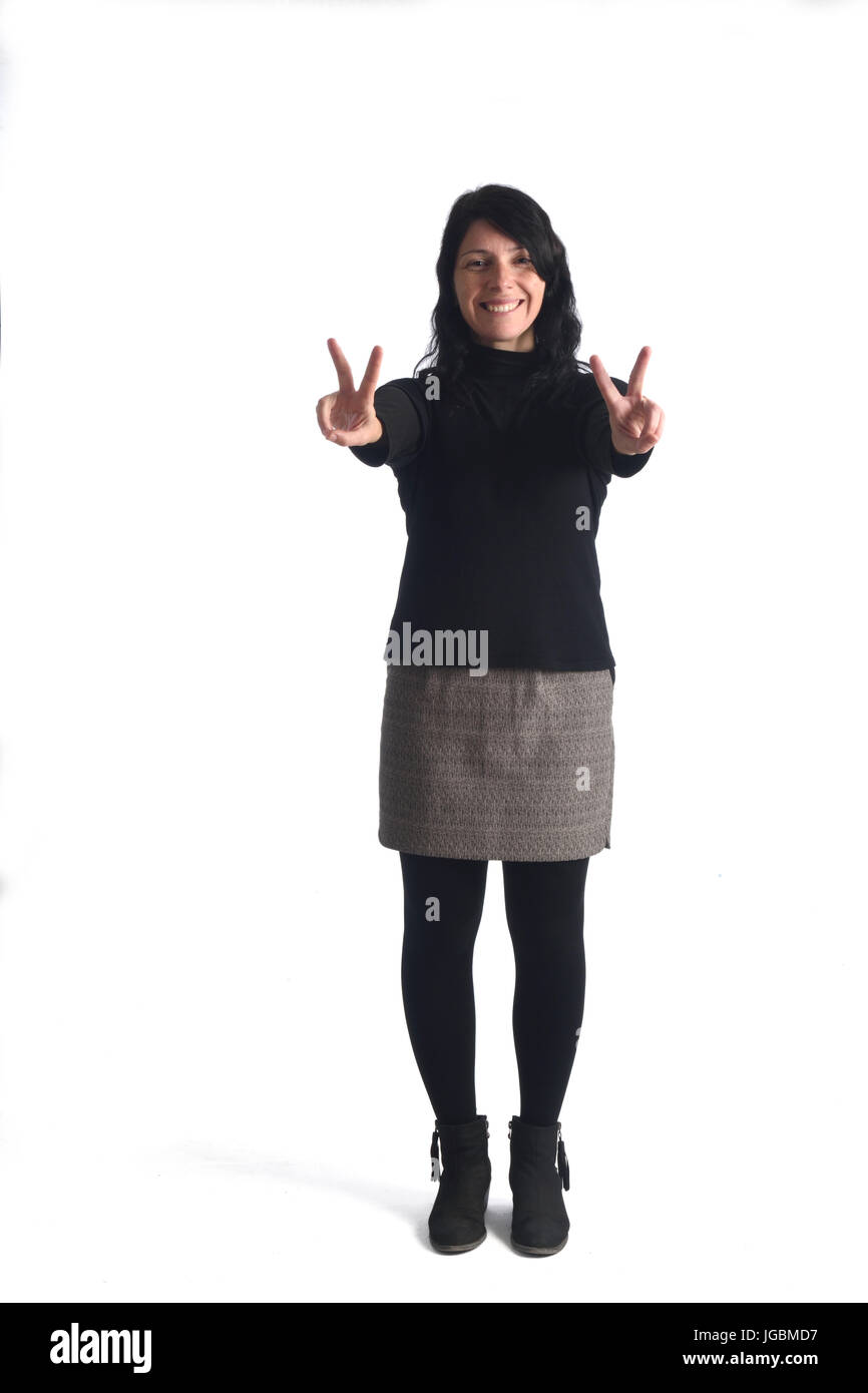 woman with victory sign Stock Photo - Alamy