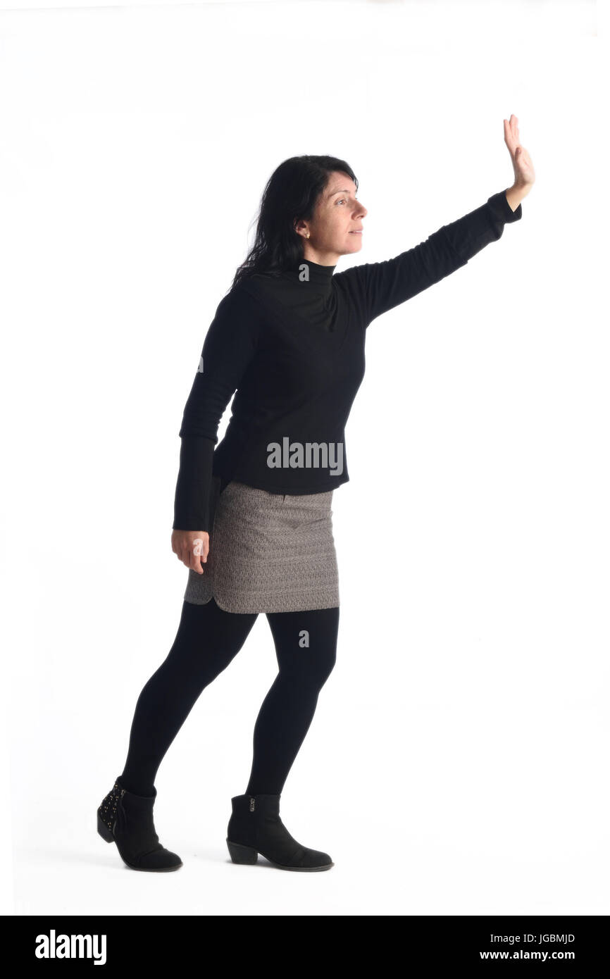 Woman with the arm raised Stock Photo - Alamy