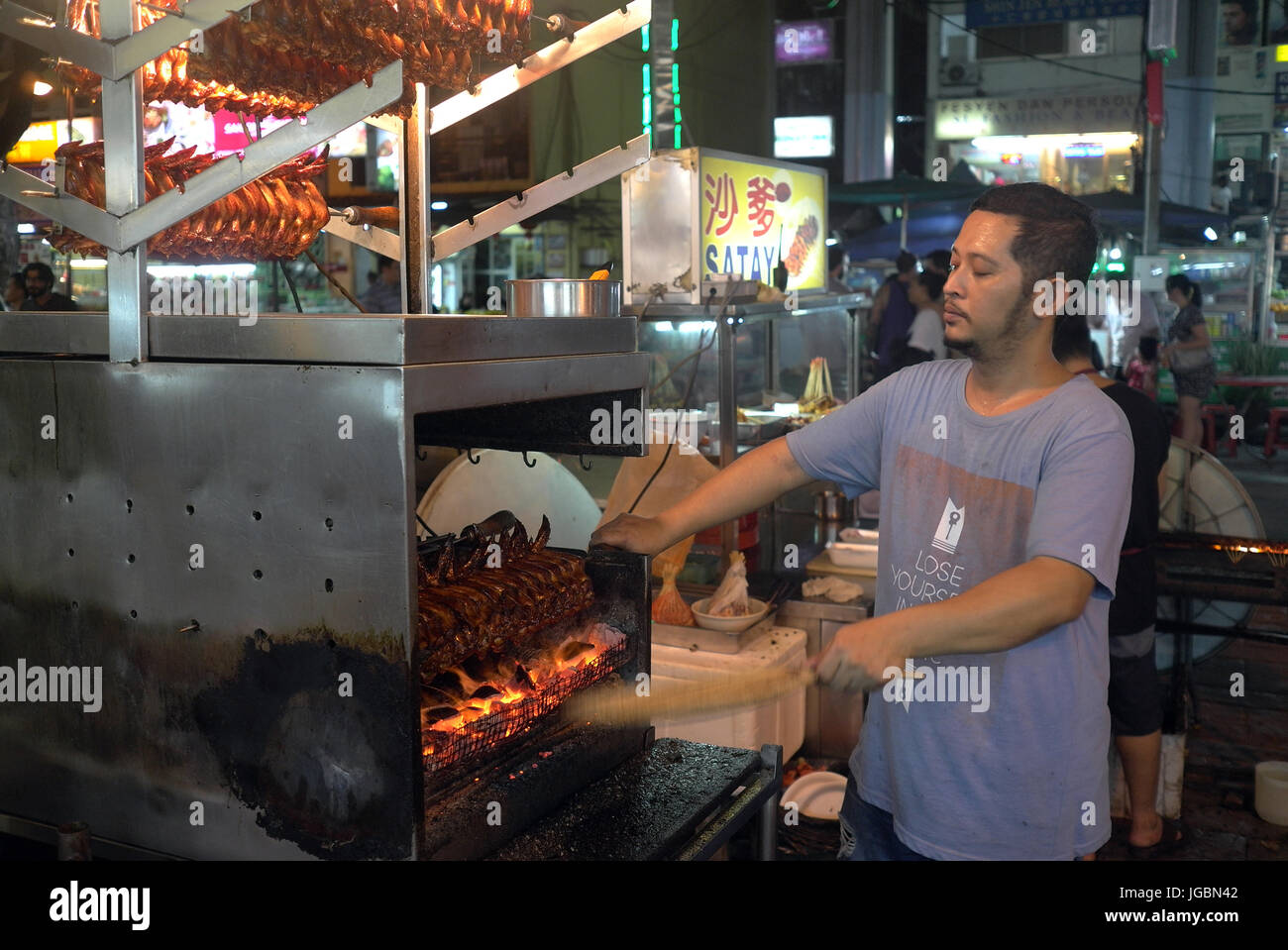 Grilled chicken wings stall at the Jalan Alor night market in Kuala ...